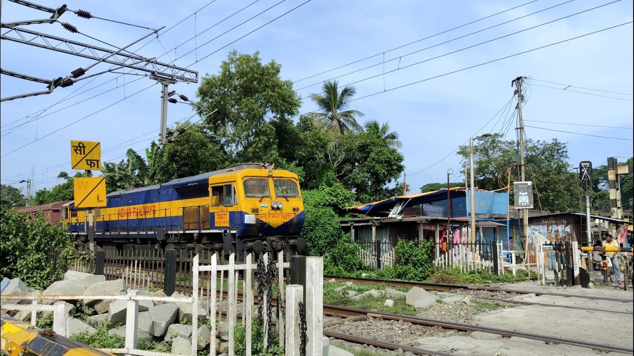 WDG4D 70377 with BCNA rake crossing rail gate and entering New ...