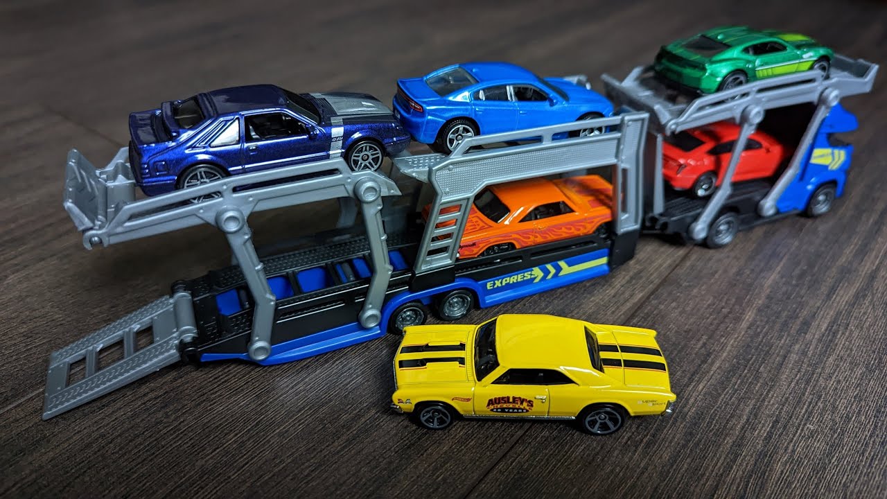 Car transporter with muscle cars - YouTube