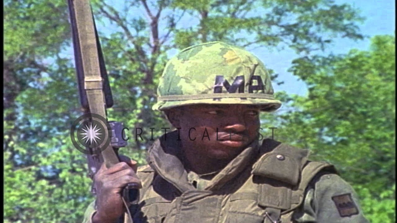 In the US MP (Military Police) directs traffic after rerouting during a ...