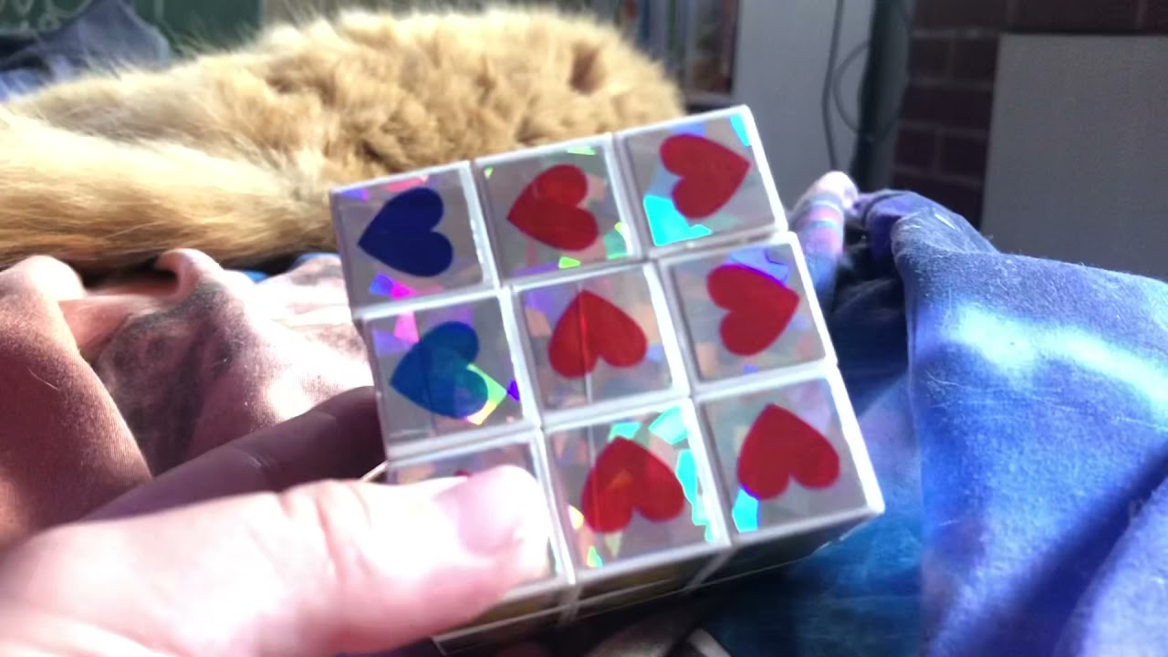 My son Owen teaching how to solve a dollar tree Rubik’s cube - YouTube