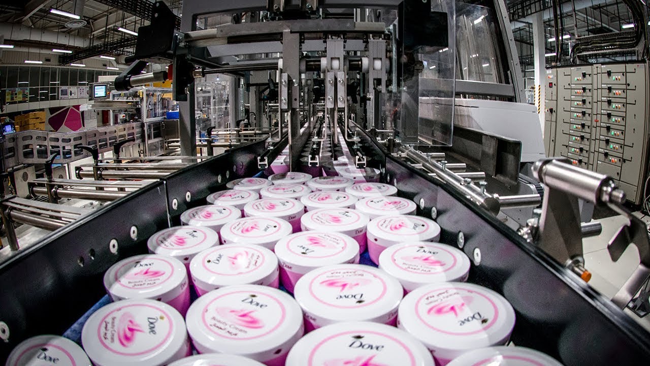 Unilever Dubai - WB46 wrap-around case packer | Sidel - YouTube