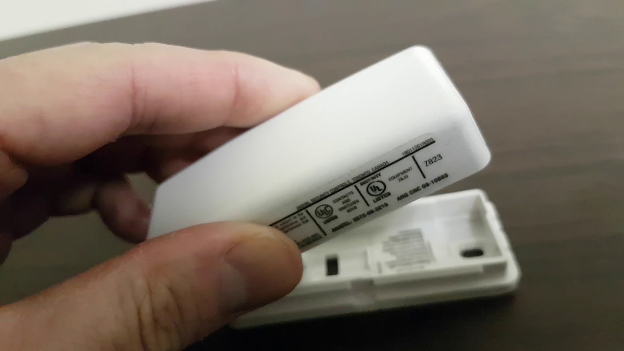 Changing a battery in a DSC Door sensor - YouTube