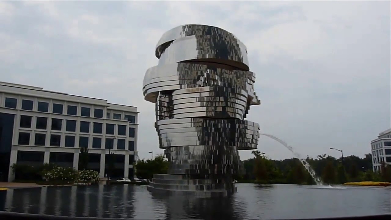 Metalmorphosis. David Cerny. Giant Metal Head Kinetic Sculpture - YouTube