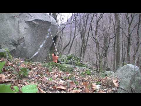 Nalle Hukkataival bouldering in Switzerland