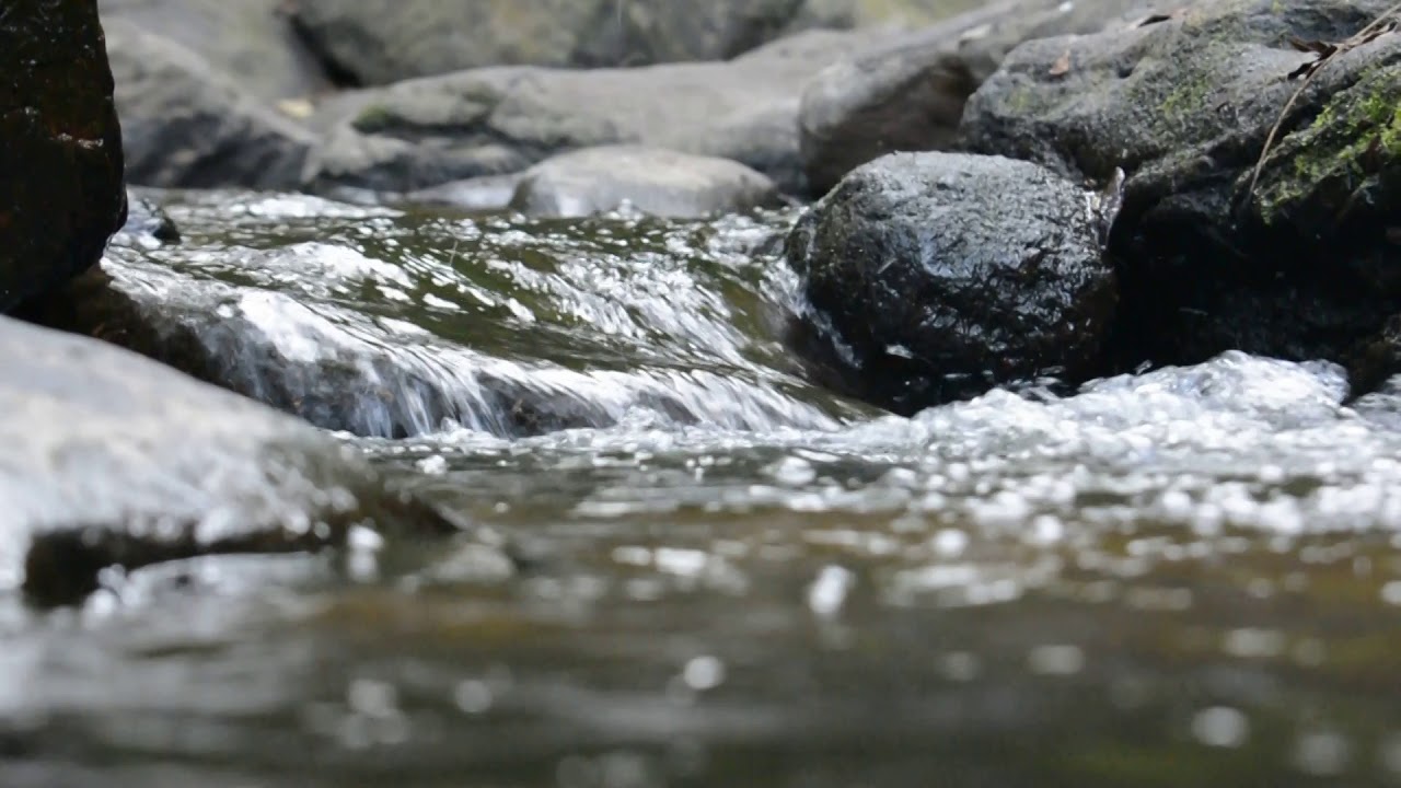 Shallow Clear Water Flowing Over Group Of Smooth River Rocks - YouTube