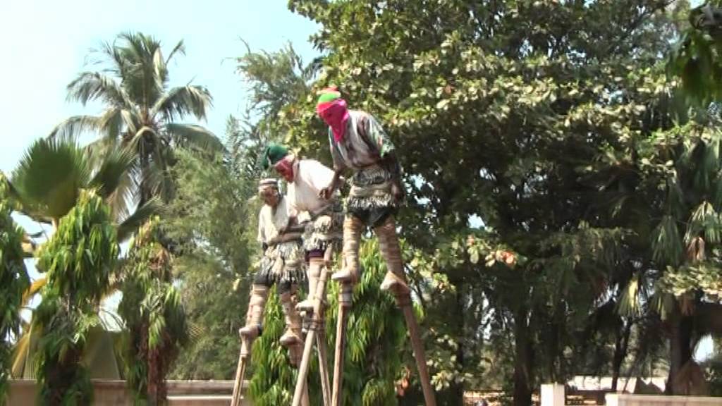 Togo... Travel memories, stilt dancers (Tchébé tradition) - YouTube