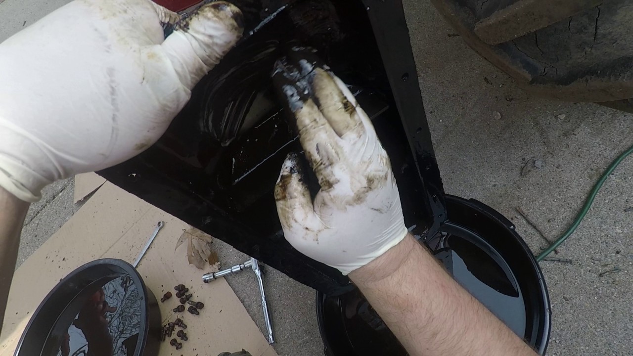 Removing oil slug from Farmall A Tractor - YouTube