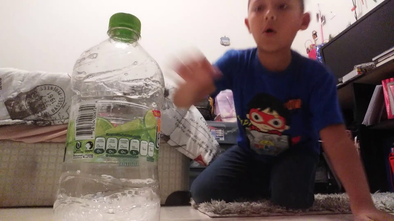 My little brother learned how to bottle flip in a part he made it - YouTube
