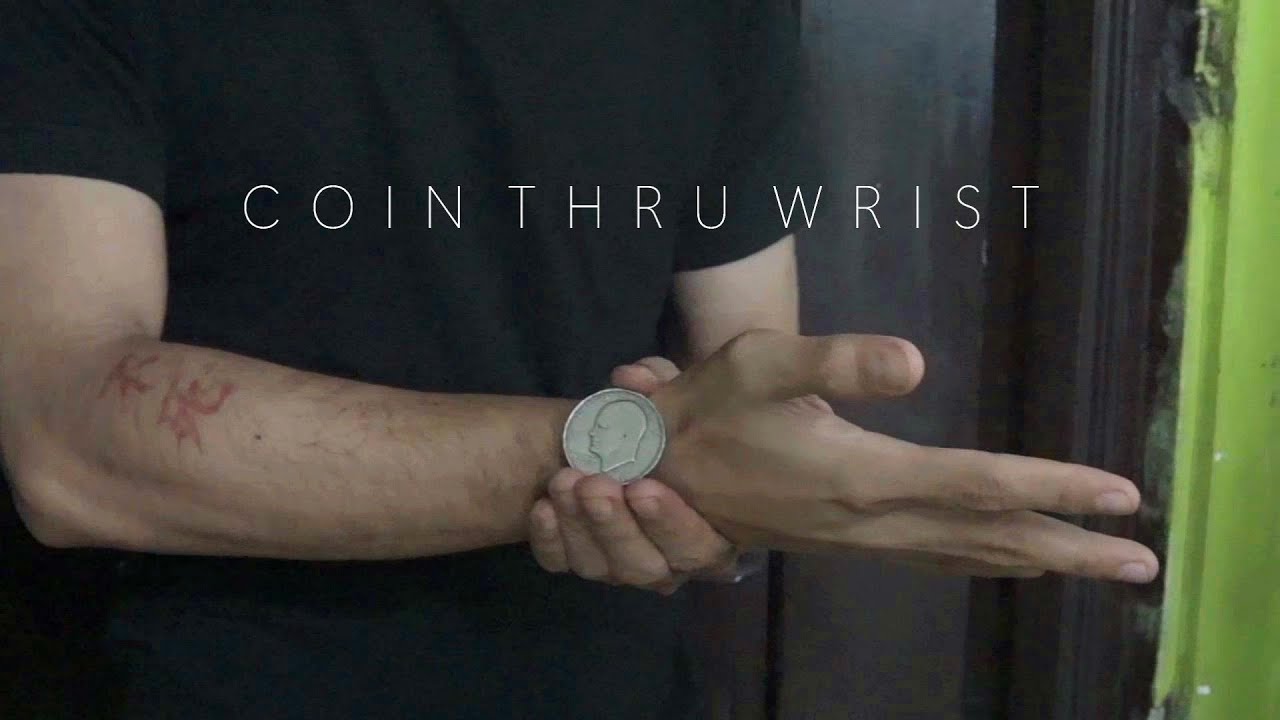 COIN THROUGH WRIST - YouTube