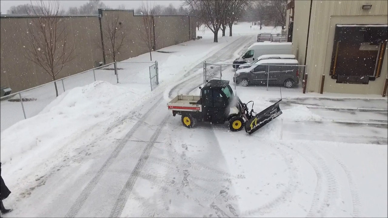 Plowing with the SnowWolf ProPlow - YouTube
