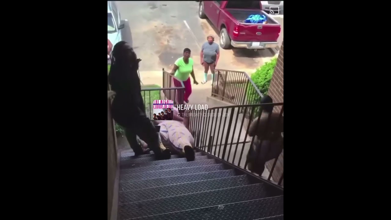 black woman falls stairs funny - YouTube
