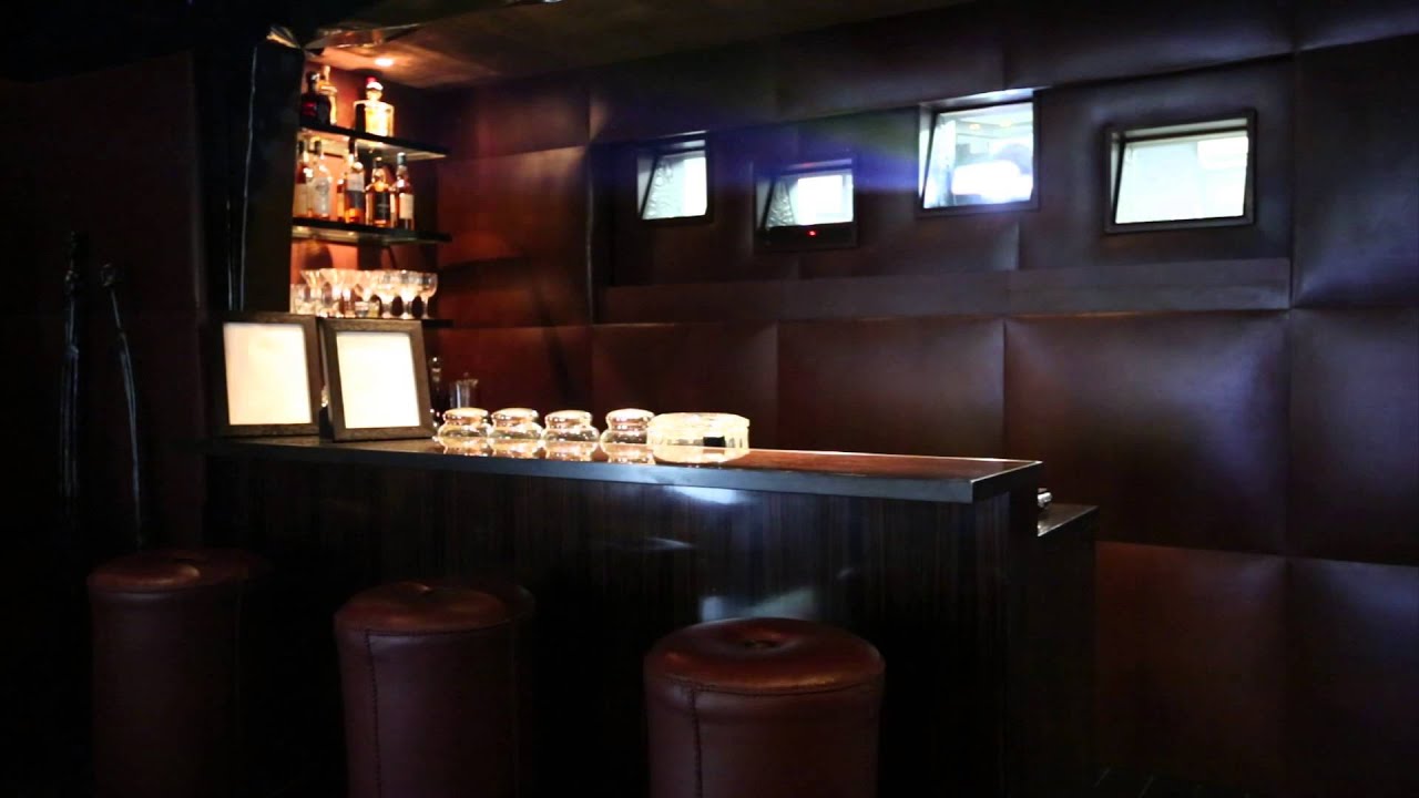 Hidden Technology - Home Theater projection ports reveal through a ...