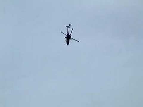 Apache Helicopter does a loop the loop at Farnborough, 2004 - YouTube