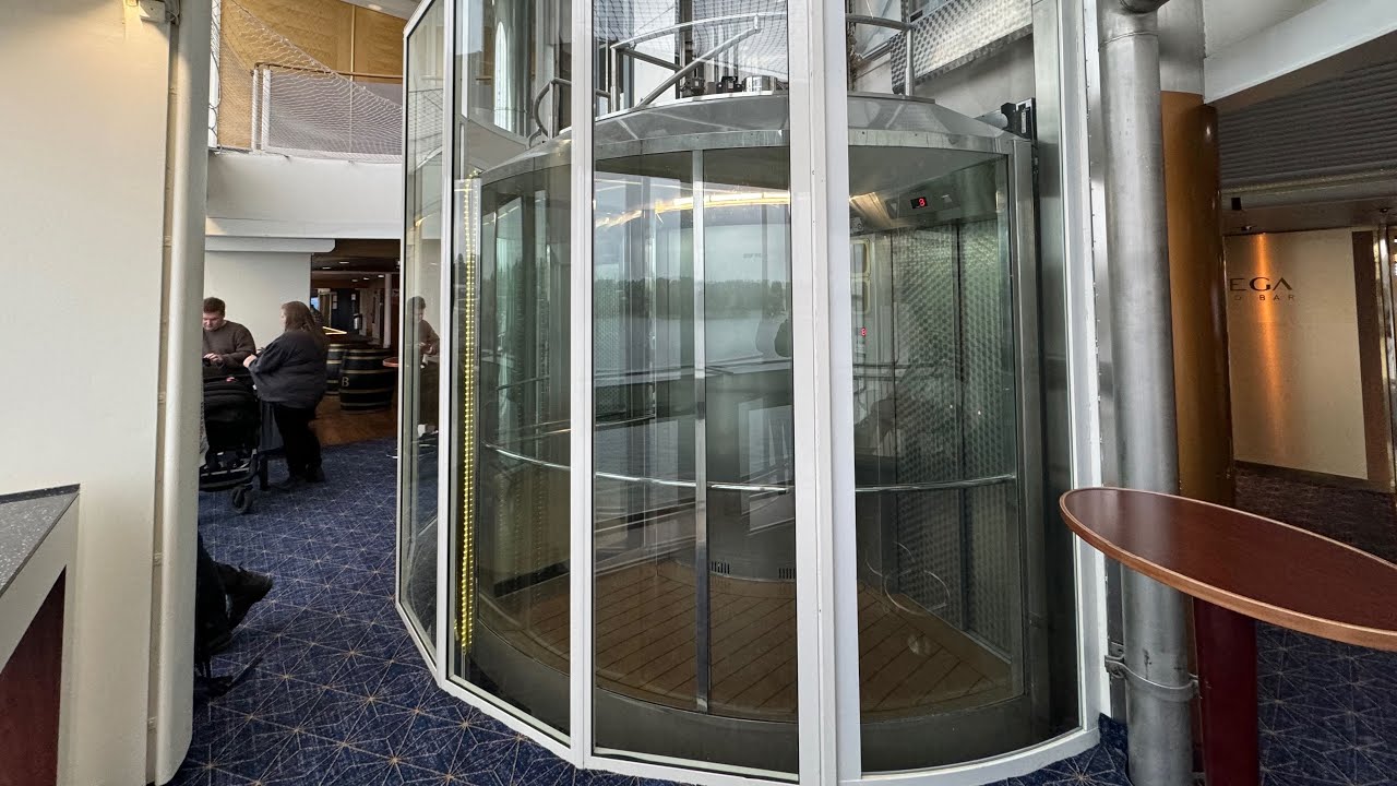 Having fun on the Glass Hydraulic Elevators on the Viking Cinderella ...