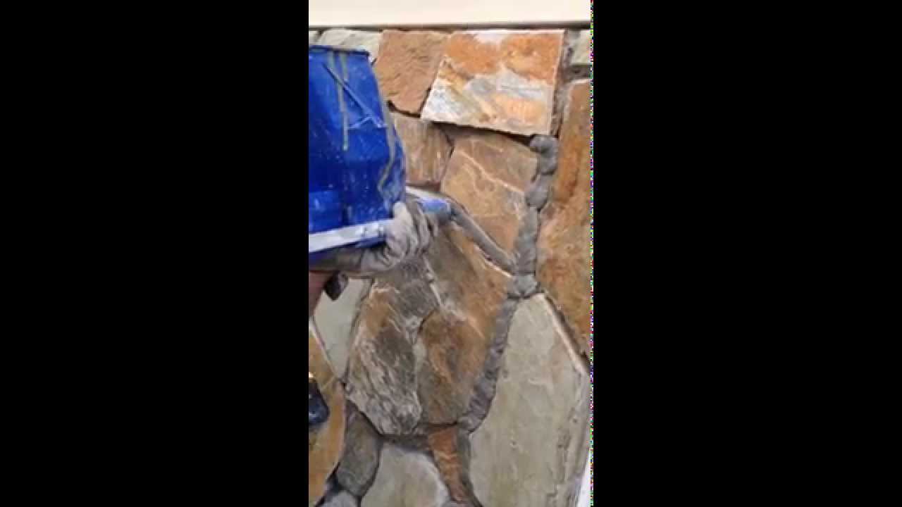 How to tuckpoint a stone wall like a pro - YouTube