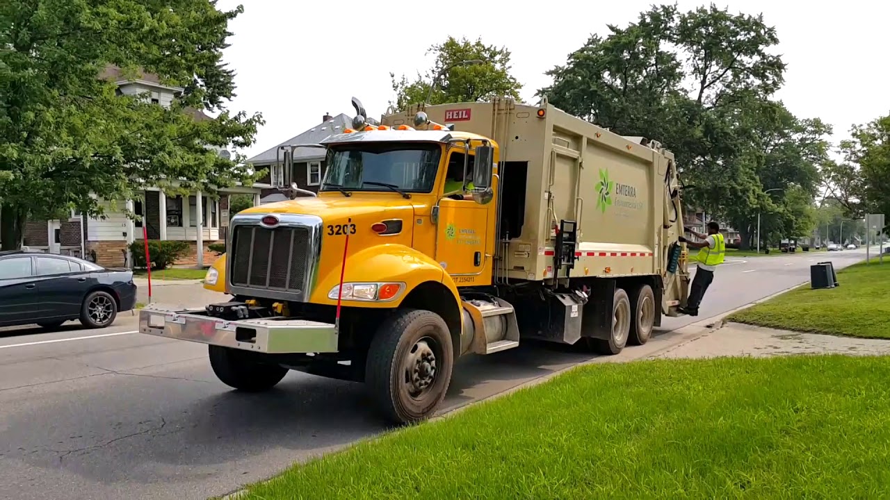 Emterra Environmental: Peterbilt 348/ Heil Split Rear Loader - YouTube