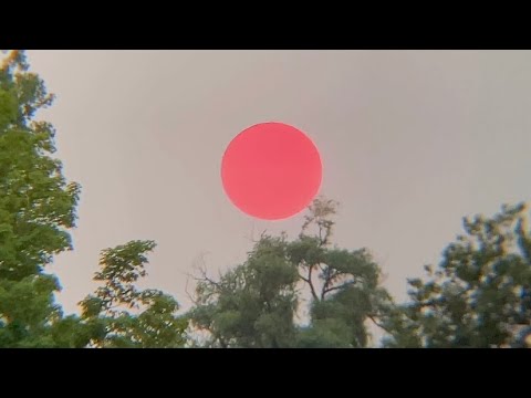 Far away Wild fire smoke creates stunning red sunsets in Michigan - YouTube