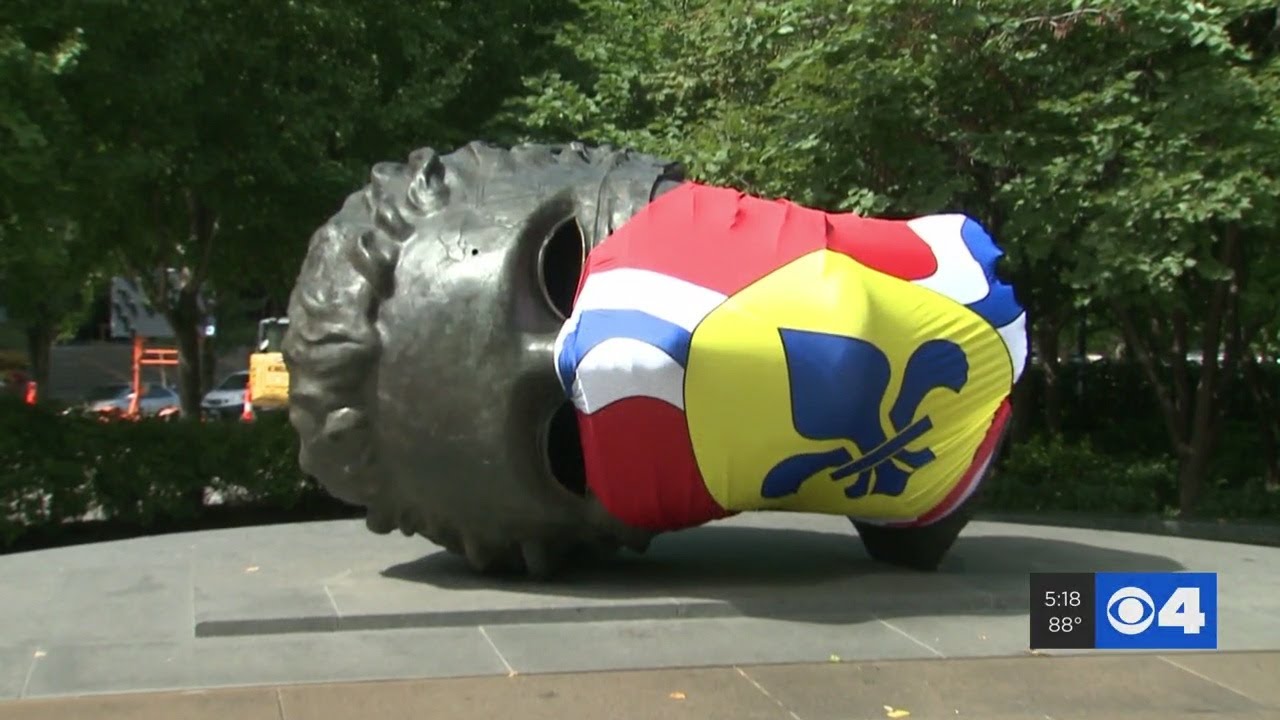 St. Louis flag-themed masks installed on statues in downtown St. Louis ...