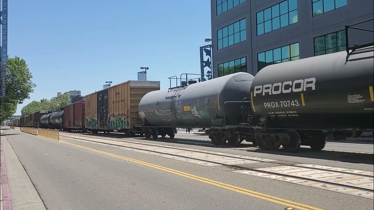 Union Pacific Mixed freight train passing Oakland Jack London Square - YouTube