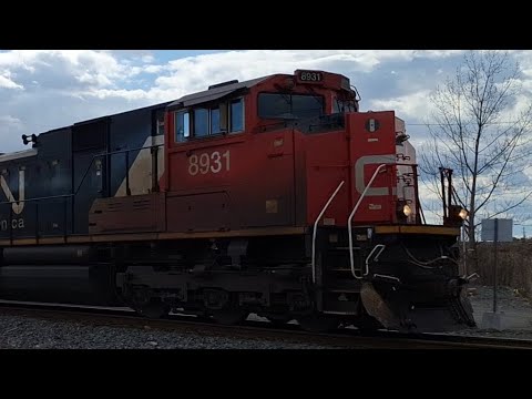 CONDUCTOR WAVES THROUGH THE FRONT ENGINE DOOR AS SD70M-2 DUO LEADS ...