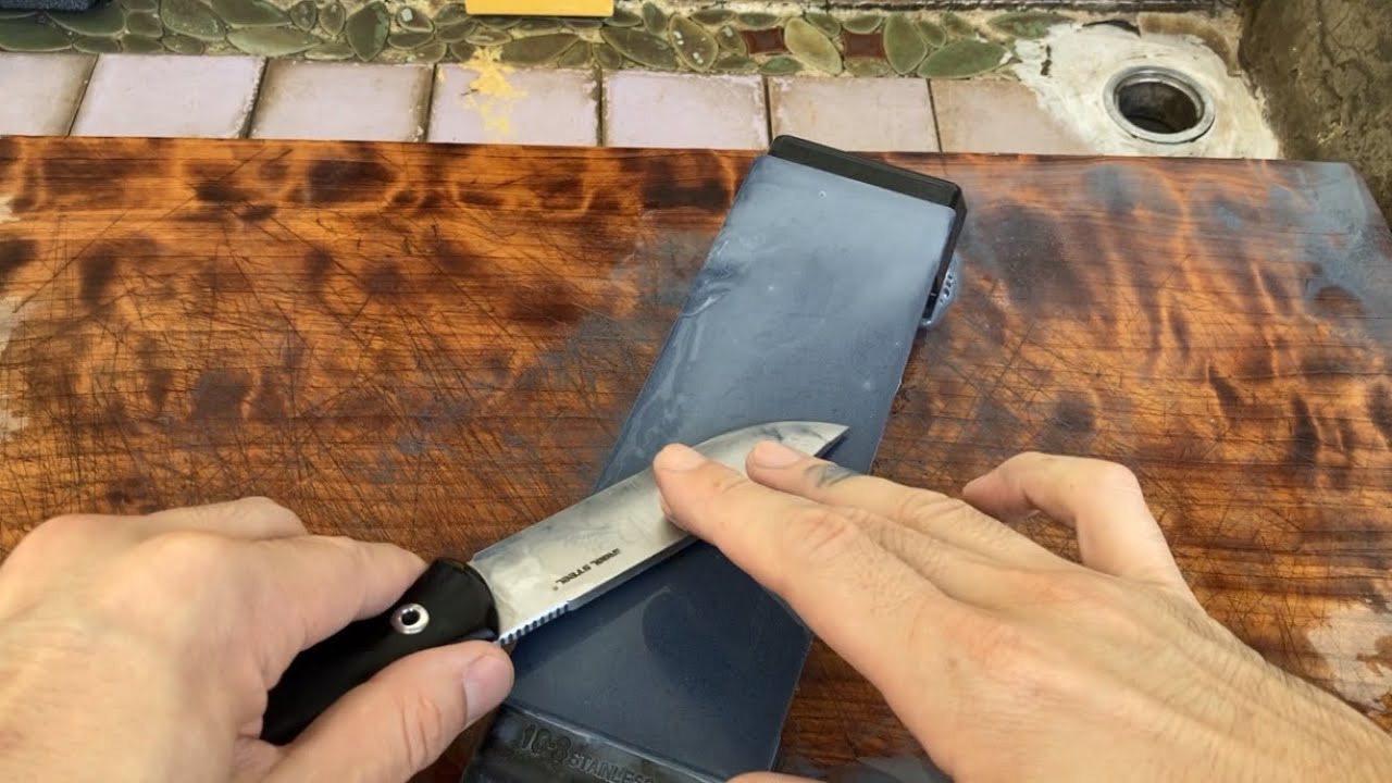 Sharpening the Convex Blade of a Realsteel Knife - YouTube