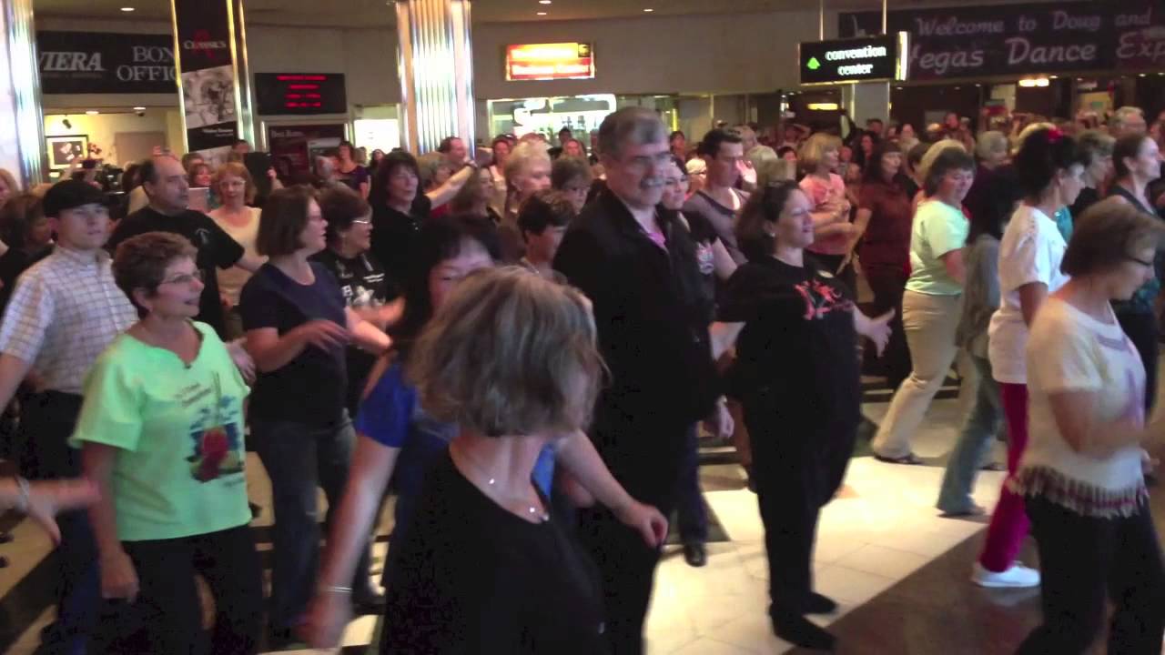 2012 flash mob line dance Riviera Las Vegas - Larger Than Life - YouTube