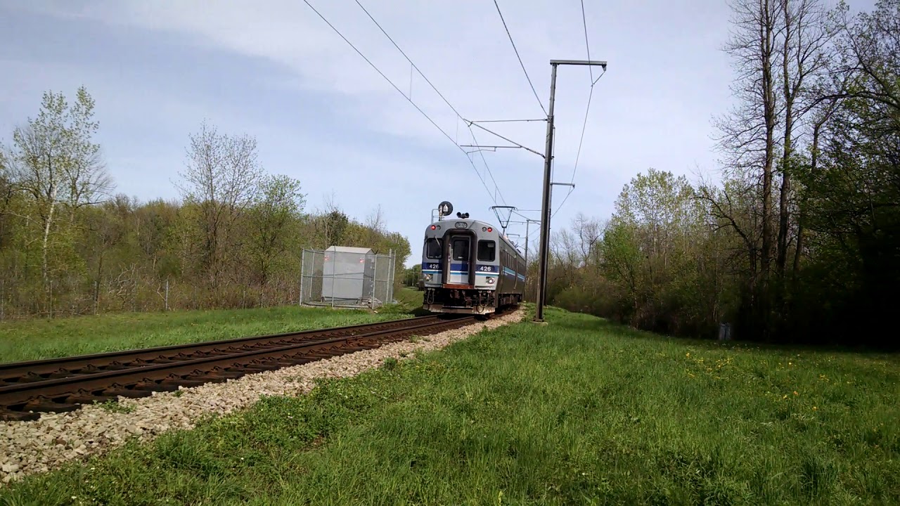 TRAINS AMT MR90 coaches on curve to Bridge in Montreal suburbs - YouTube