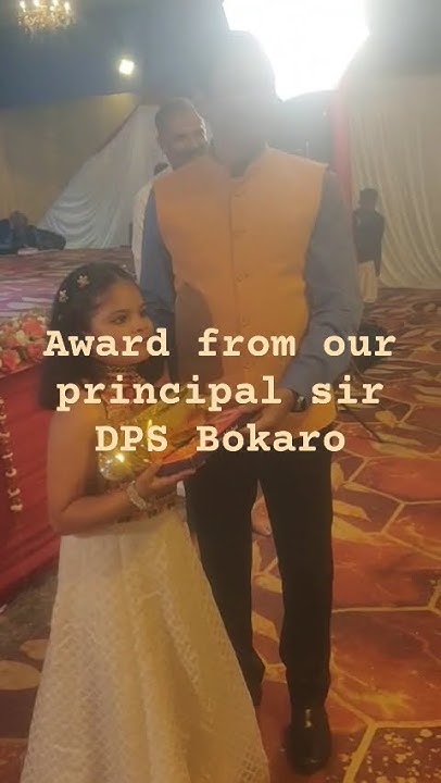 receiving award from our principle sir mr. A S Gangwar DPS BOKARO STEEL CITY# student ...
