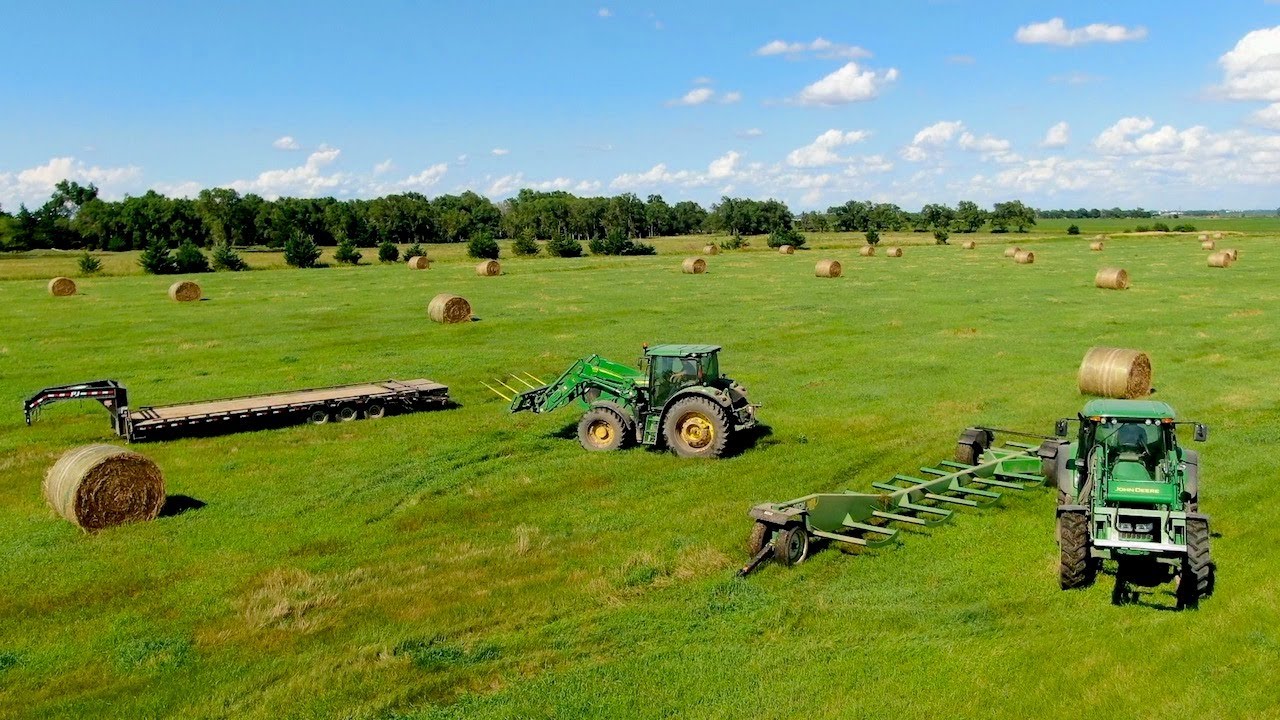 Hauling Large Round Bales in South Dakota - YouTube