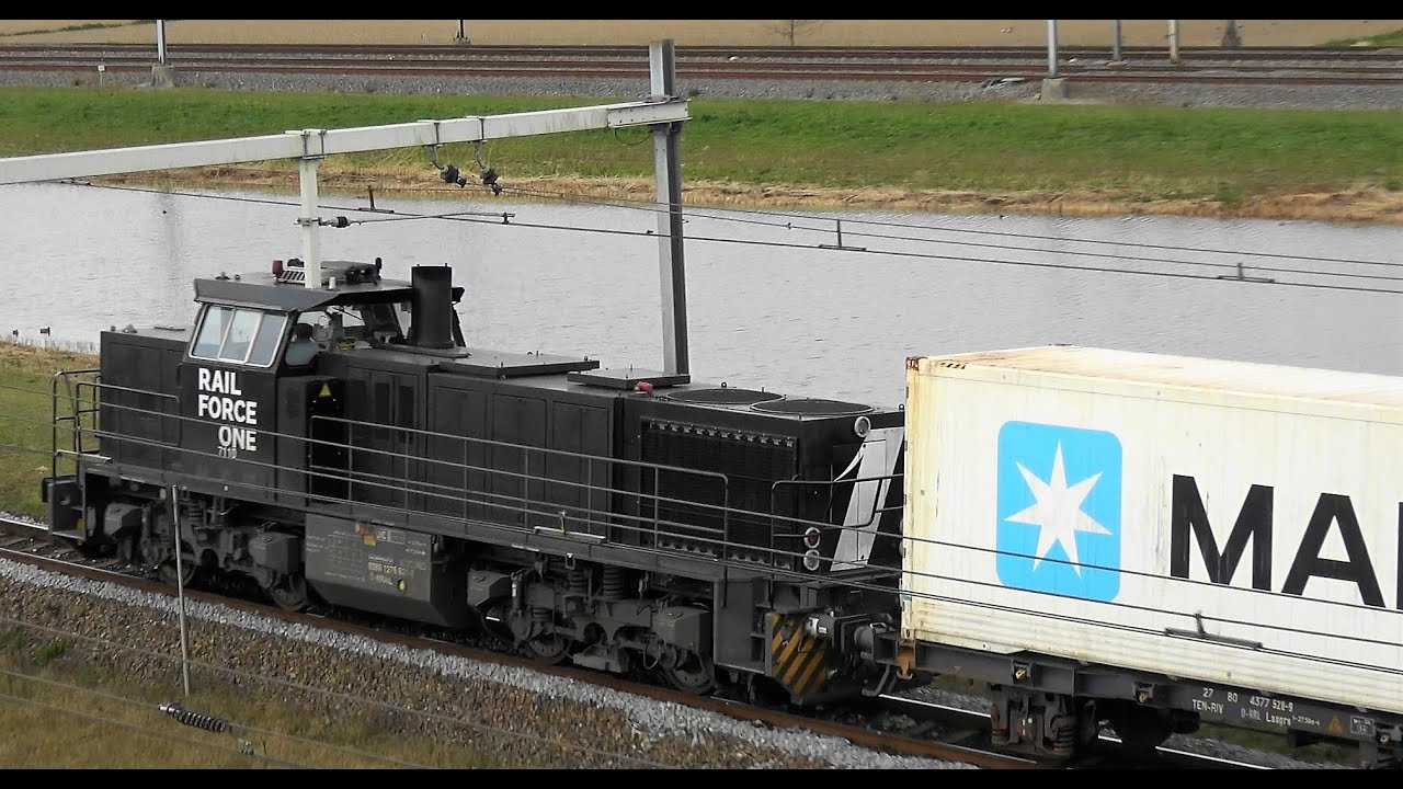 7110, MaK G1206, Rail Force ONE, w/ containertrain pass railyard ...