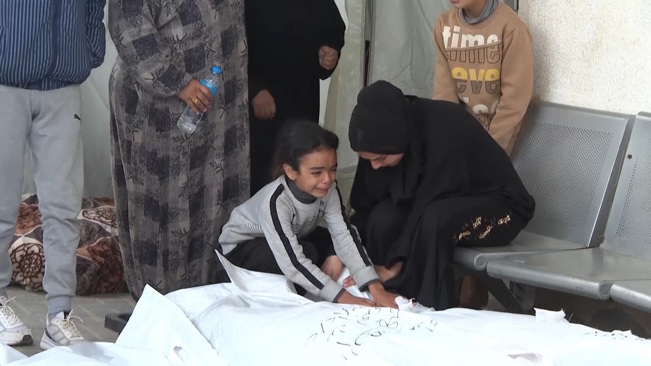 Boy and girl cry for their father killed in Israeli strike on Rafah in ...