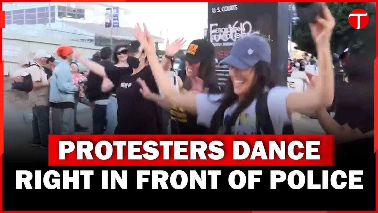 WATCH: Protesters Dance at Anti-ICE Demo in LA - YouTube