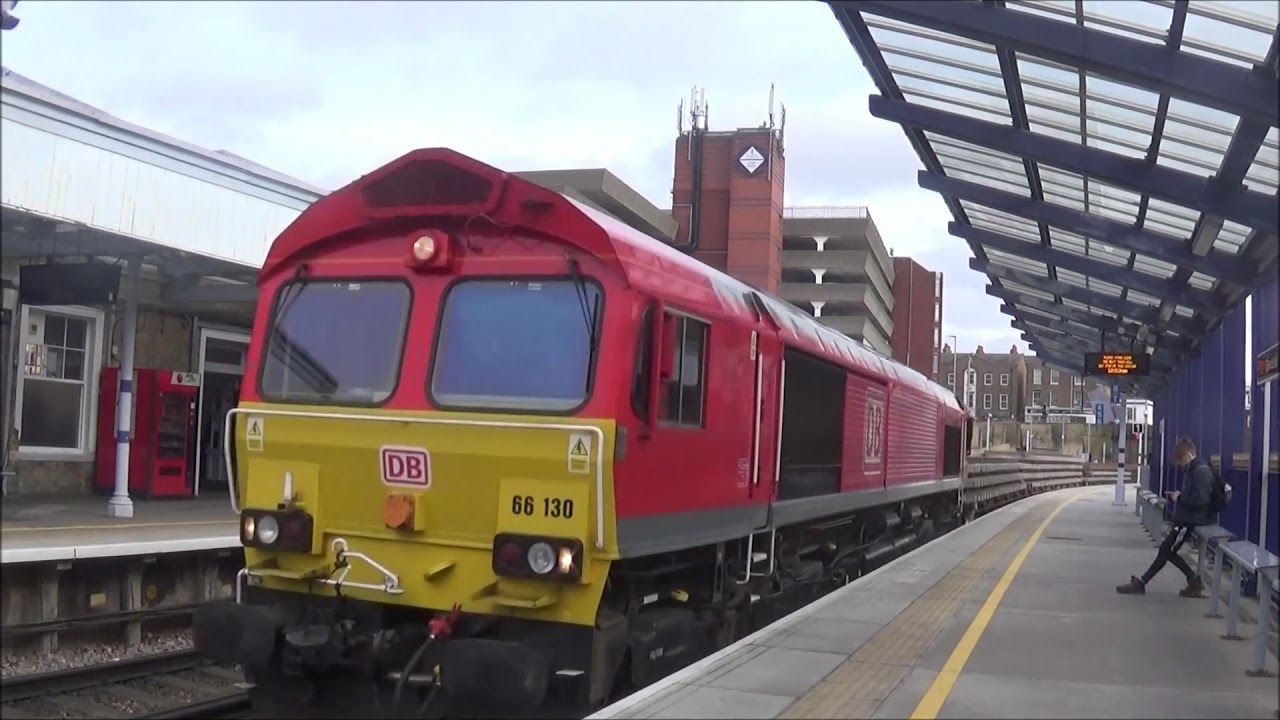 DB class 66130 pulling piles of track - YouTube