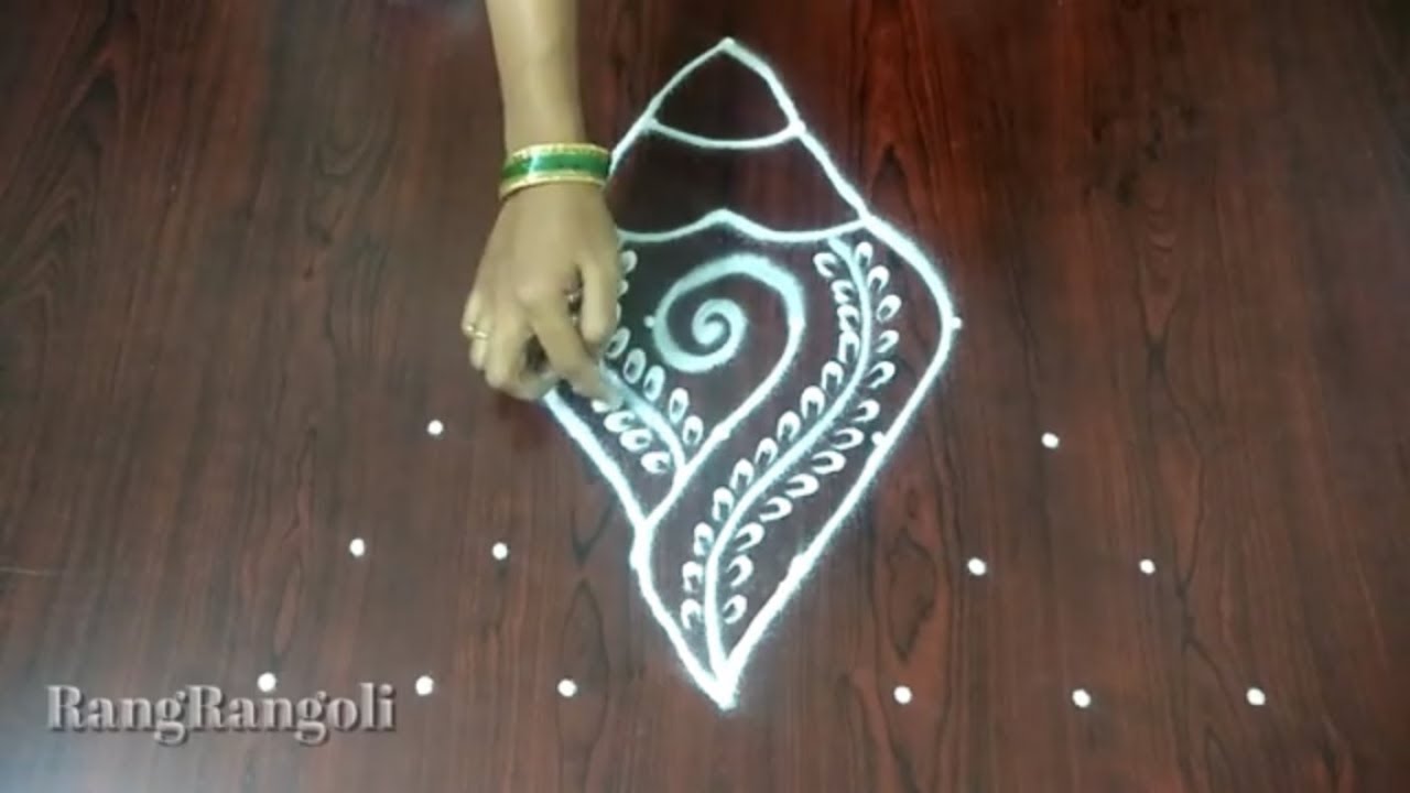Shanku Rangoli with 7*1 dots | Shankhu Muggulu | Sangu kolam ...