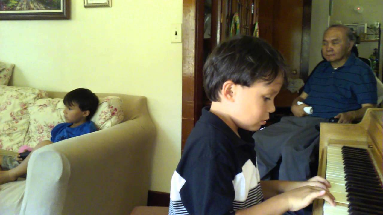 Isaiah playing the piano like a boss - YouTube