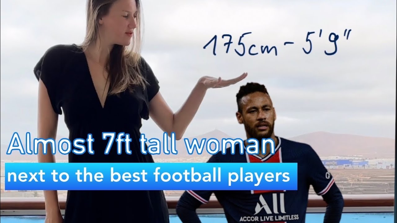 Almost 7ft tall woman next to the best football players in the world. - YouTube