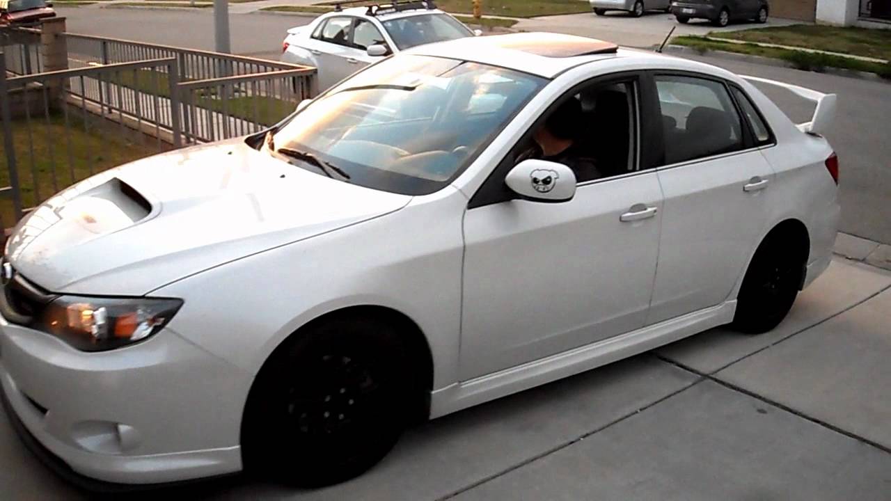 09 WRX on Agency Power exhaust w/ titanium tips installed - YouTube