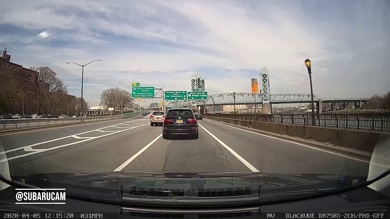 Two cars merge at the same time to different exits. | New York City ...