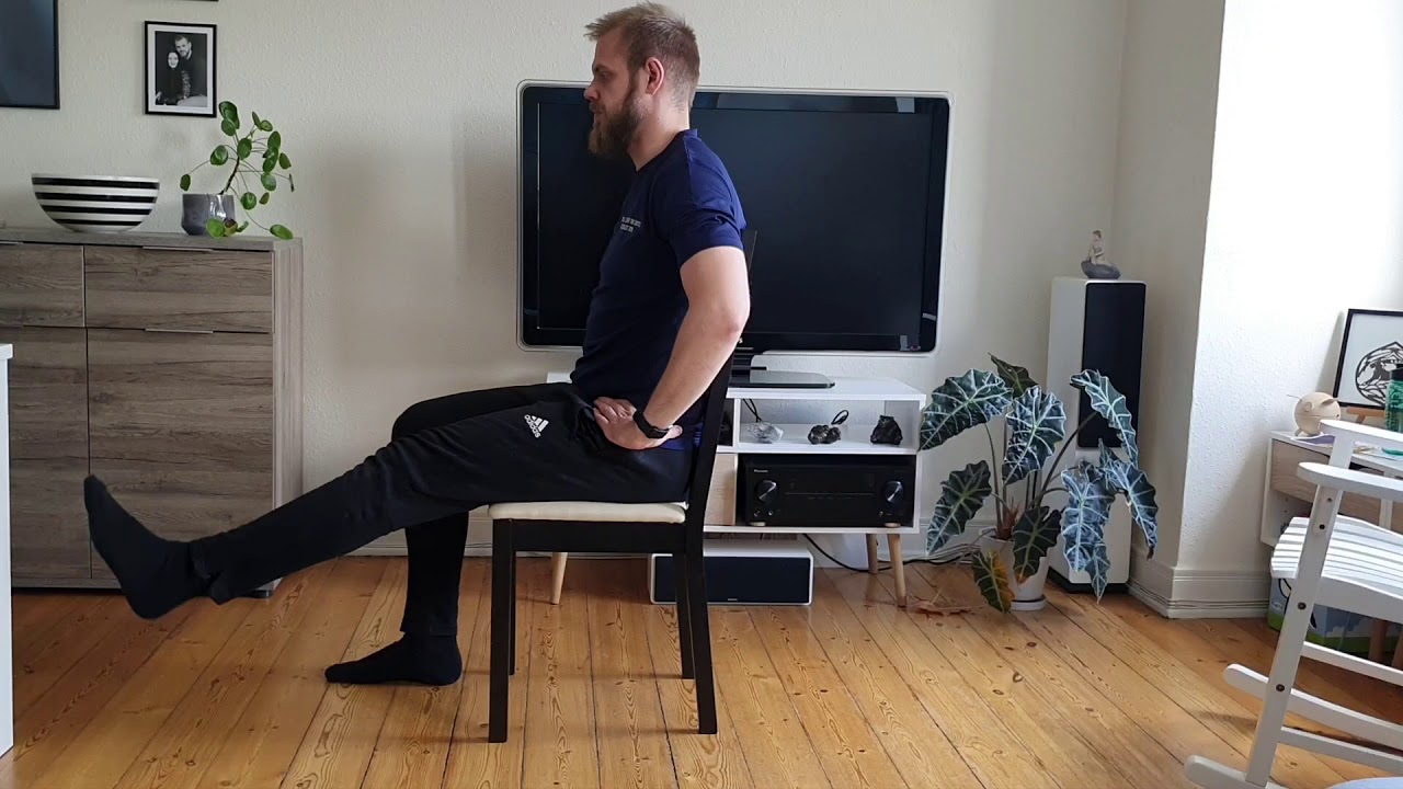 Seated leg stretch - YouTube