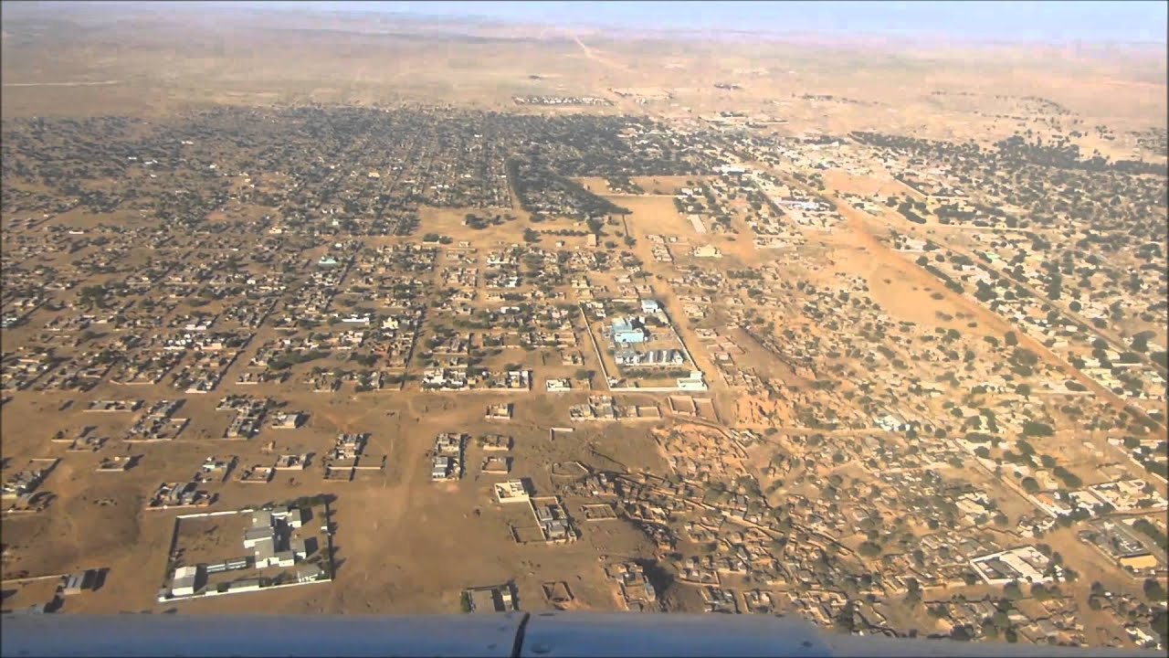 Helicopter flight out of Geneina, Darfur - YouTube