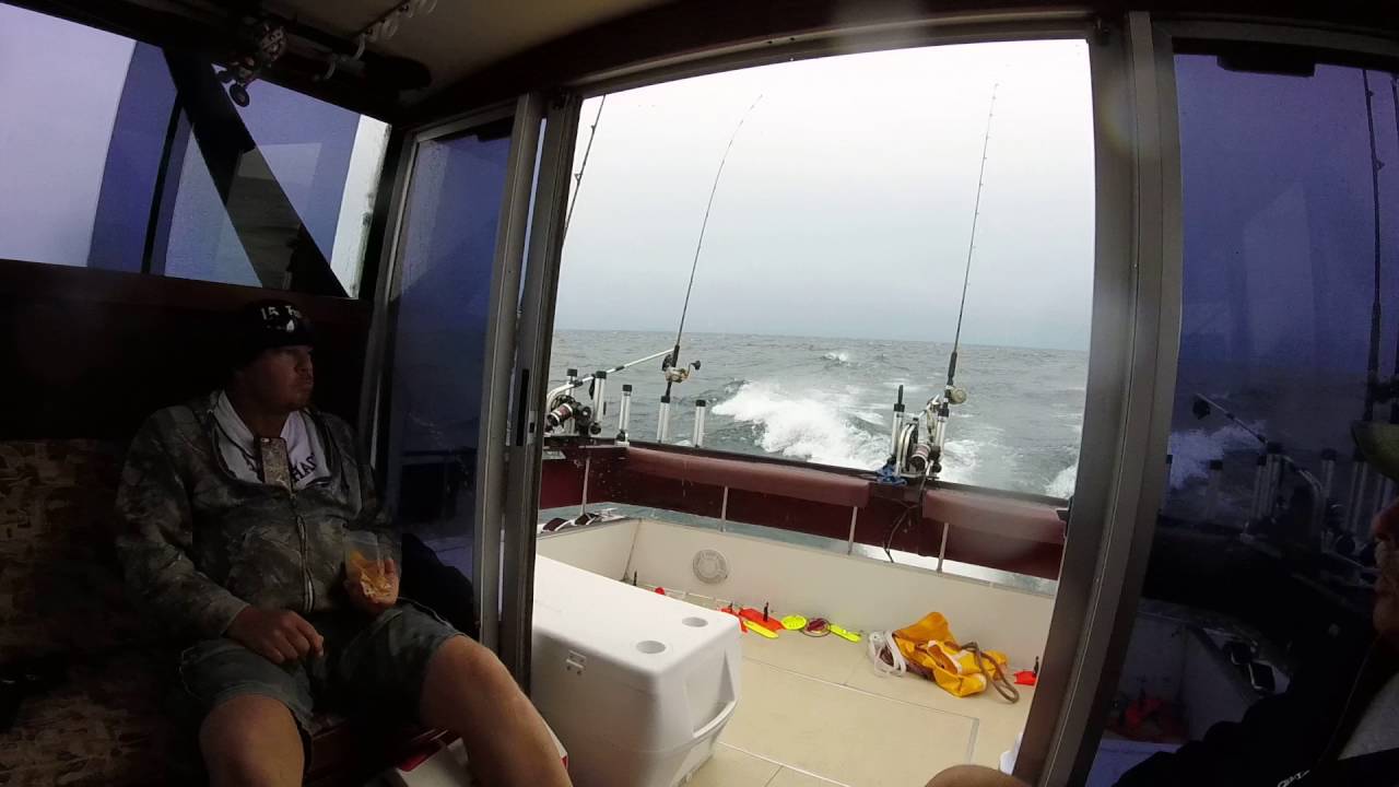 Outrunning Storm on a Boat in Lake Michigan with choppy waters with ...