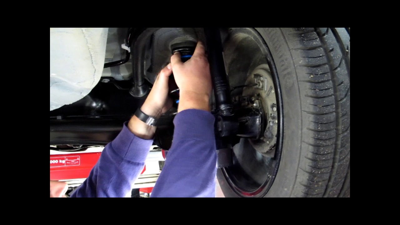 Fitting a helper spring kit - YouTube
