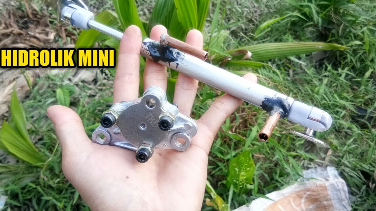 make a simple mini hydraulic machine - YouTube