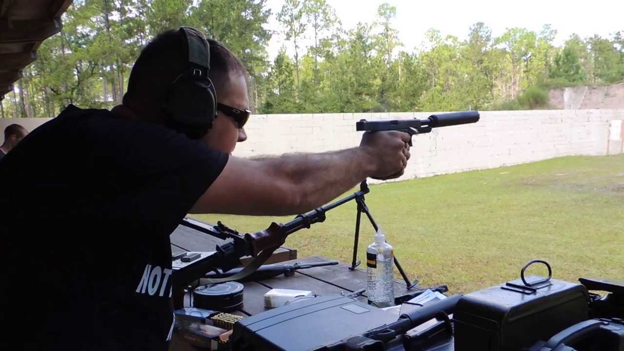 Thompson Machine QMF2 Suppressor on Glock 21 - YouTube