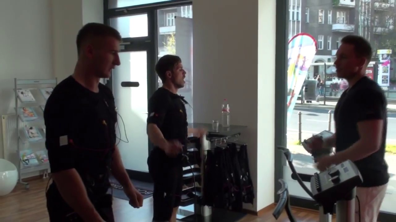 Bodybuilder exercising electric muscle stimulation training Miha ...