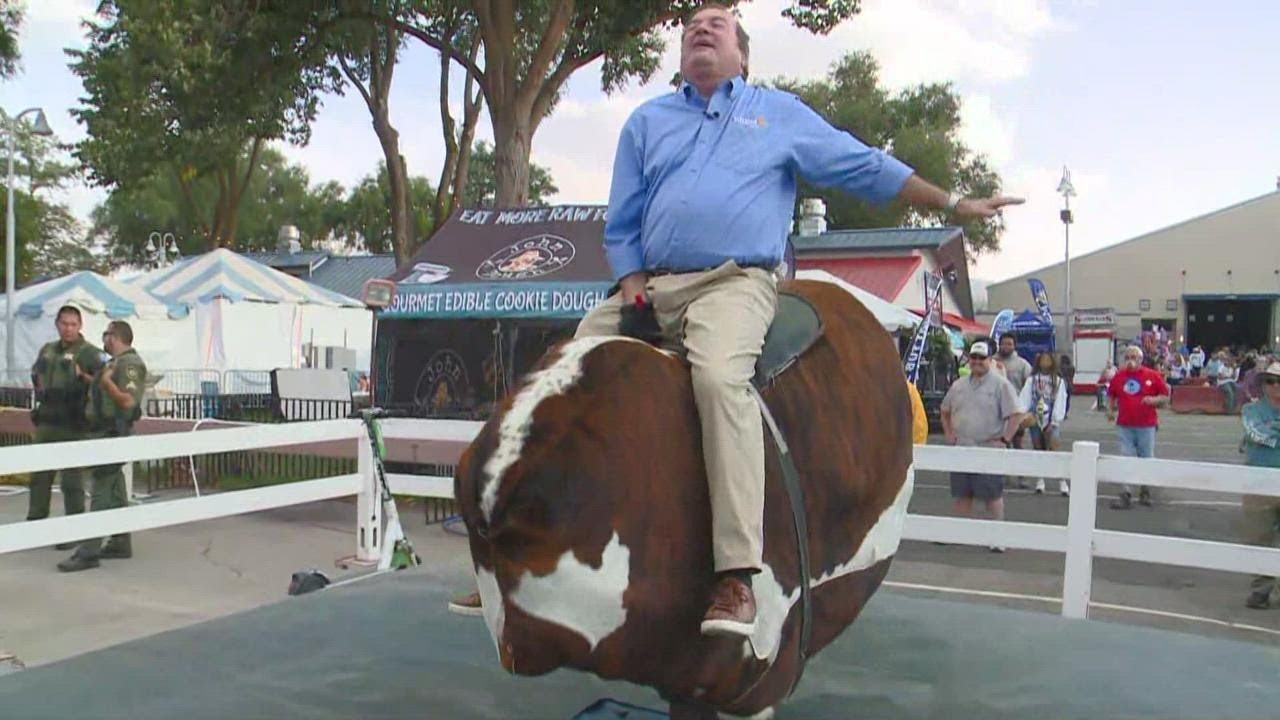 Tom Sherry tackles the mechanical bull at the Spokane Interstate Fair ...
