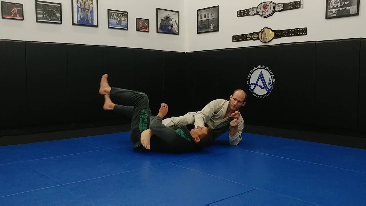 Coach Brandon teaches the scissor sweep from guard - YouTube
