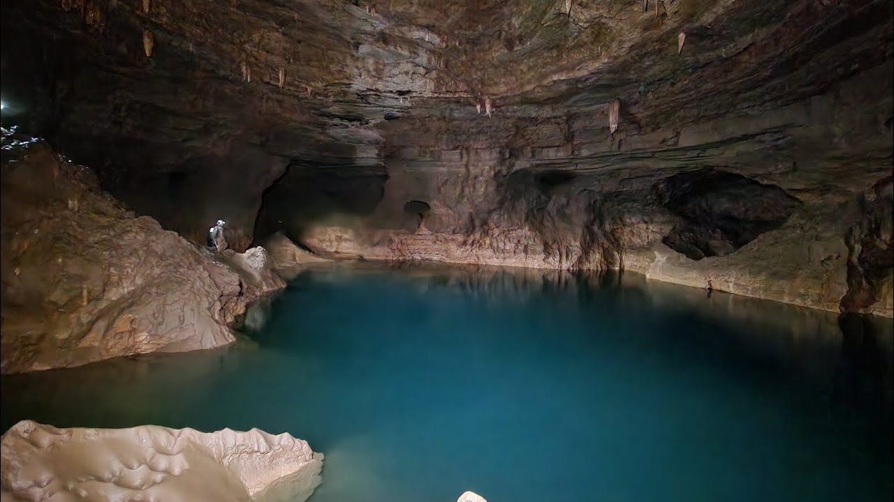 Camp survey trip in Missouri's Carroll Cave. Downstream leads to the ...