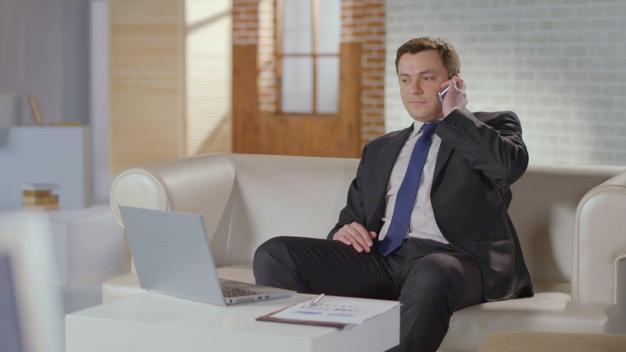 Real estate broker calling client, starting phone conversation. Stock ...