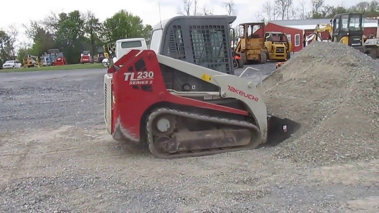 Takeuchi TL230 - YouTube